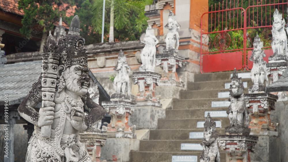 Buddhist temple Brahma Vihara Arama with statues of the gods on Bali ...