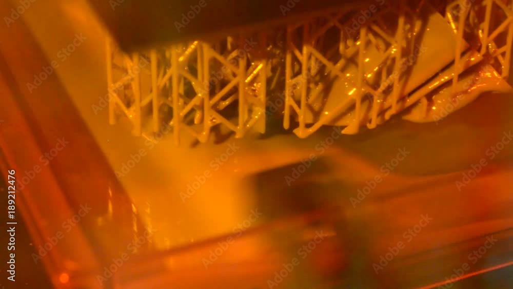 Stereolithography DPL SLA 3d printer create and liquid drips, platform ...