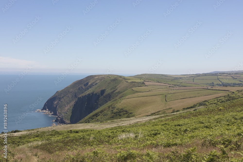 Steep cliffs fn the North Devon coast drop into the Bristol Channel and ...
