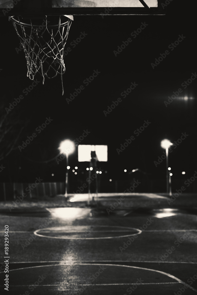 Basketball court by night Stock Photo | Adobe Stock