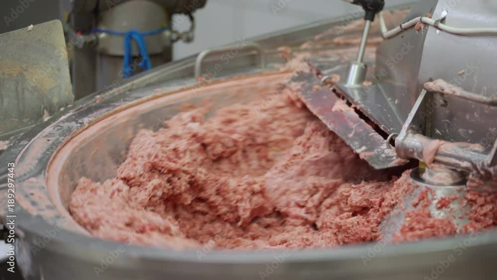 Industrial sausages production process at meat and sausage making plant ...