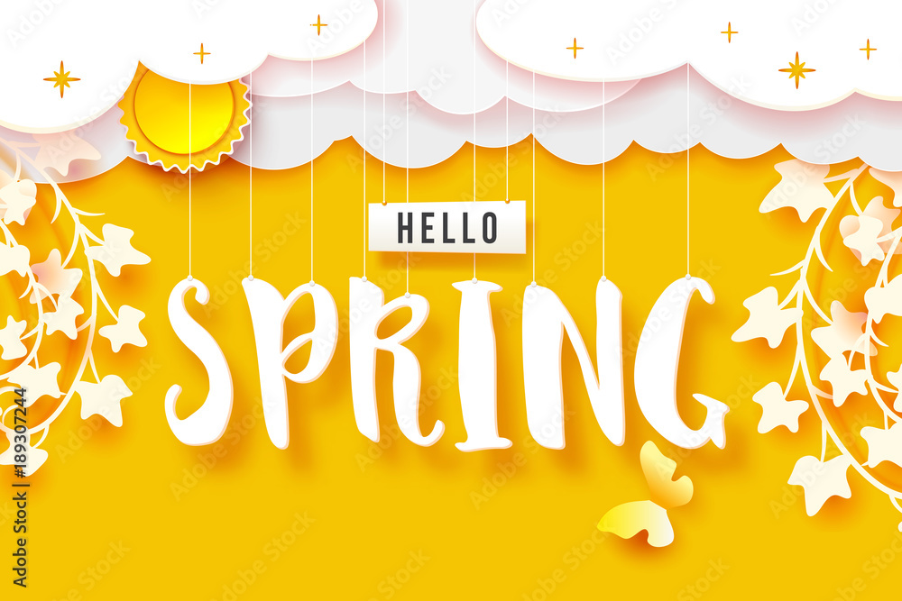 Hello spring banner. White paper clouds and twigs with leaves on bright ...