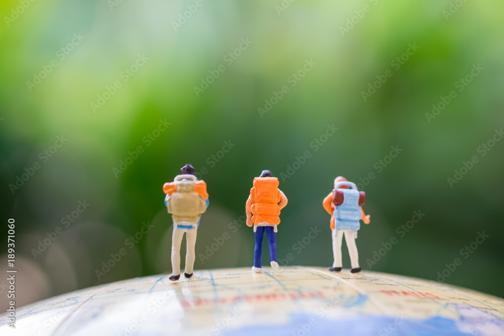 Travelling concepts. Group traveler miniature mini figures with ...