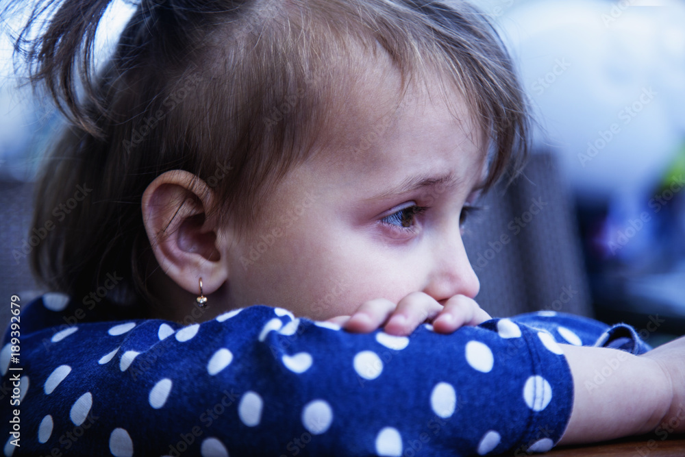 Portrait of little cute child girl expressing sadness (Gestures, body ...