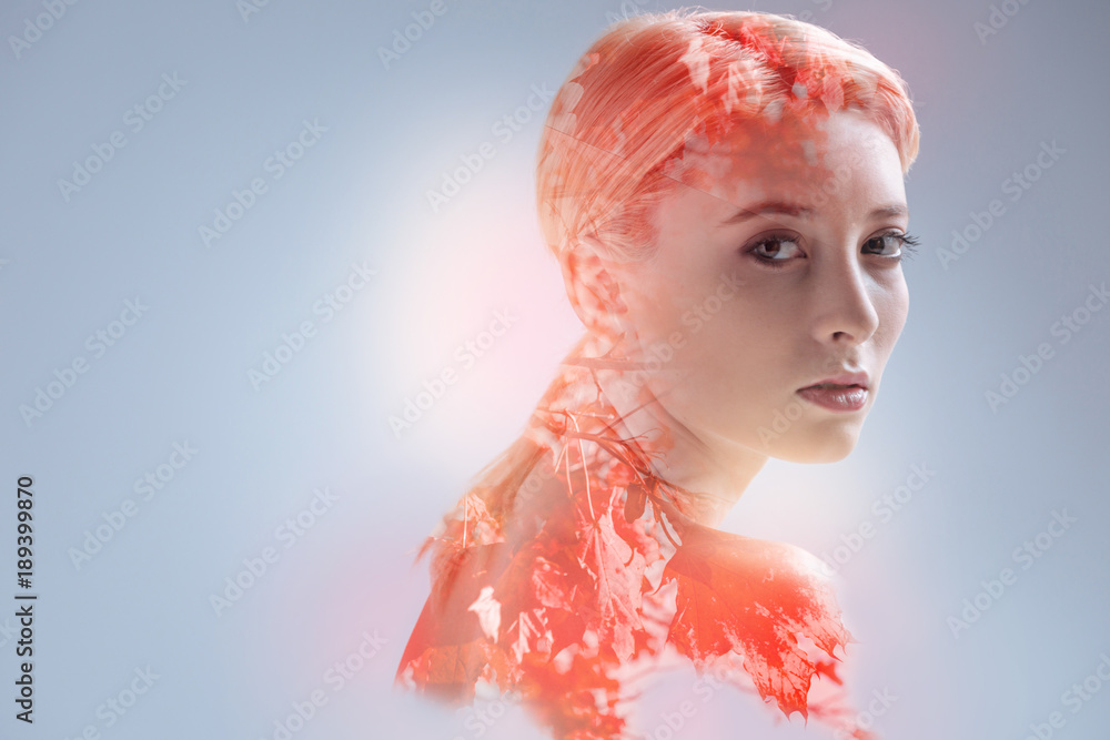 Difficulties in creation. Naive innocent beautiful woman gazing at the ...