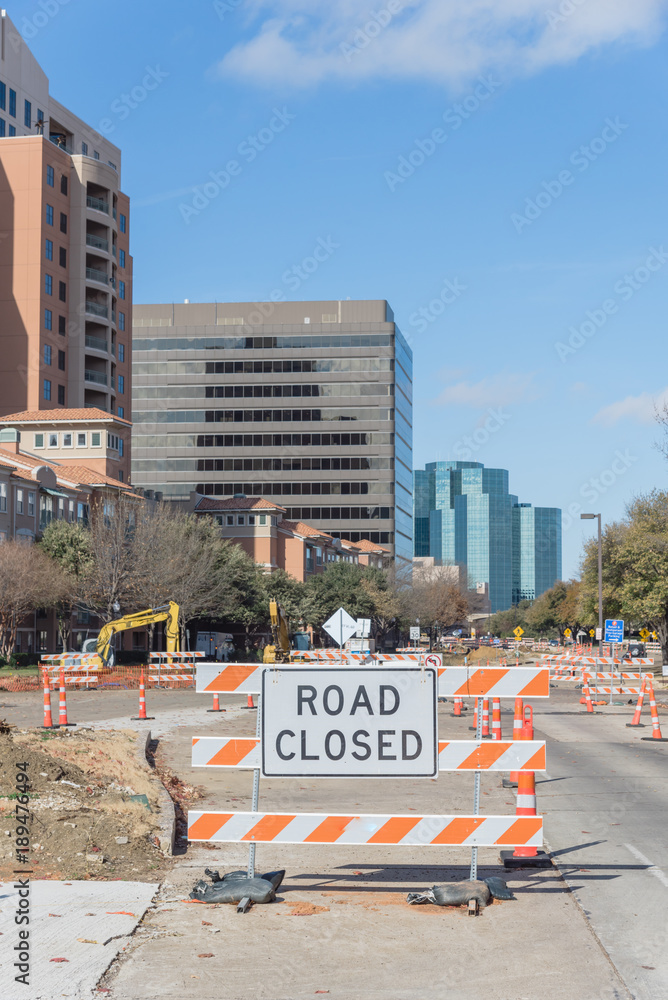 Road closed sign in Downtown Irving, Texas, USA under cloud blue sky ...