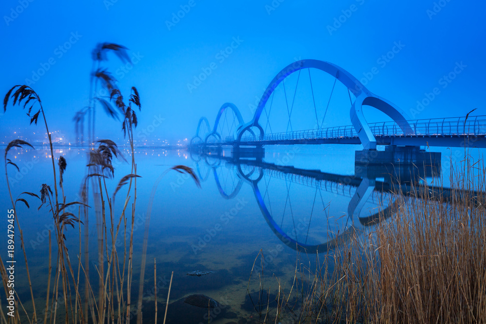 Solvesborgsbron pedestrian bridge at dusk in Sweden. At 756 meters the ...