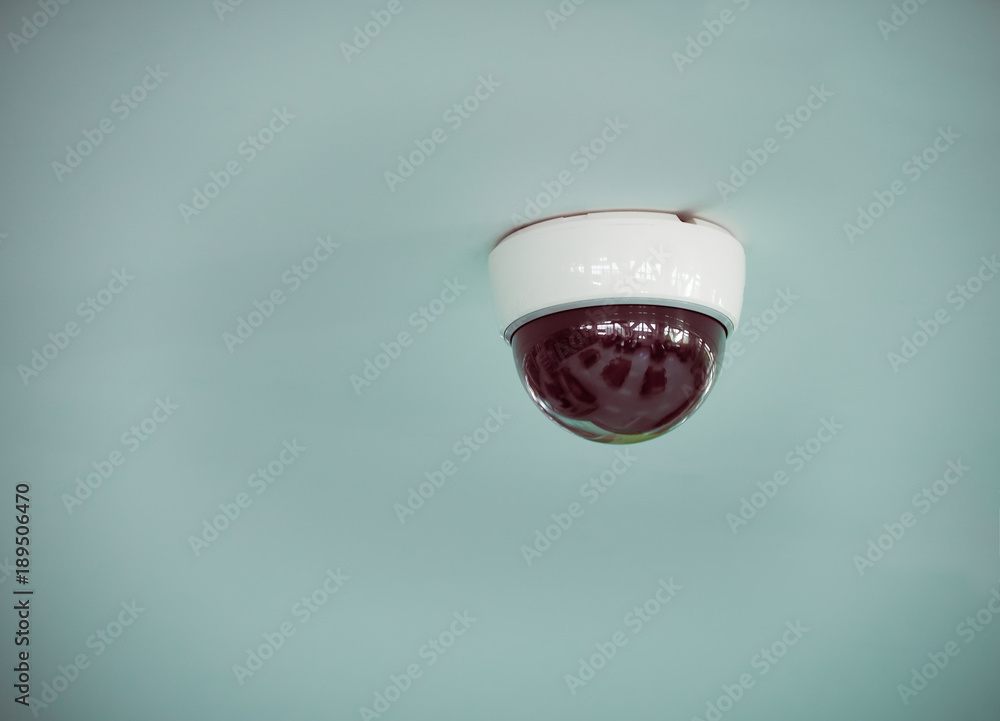 CCTV camera security mounted on the ceiling in the office , With place ...