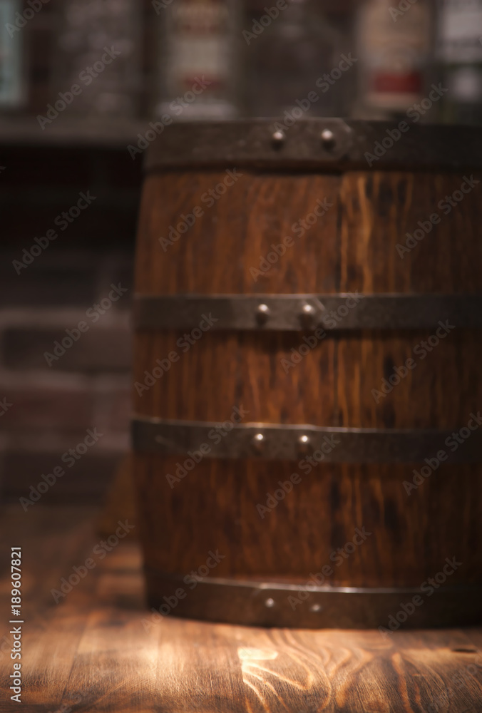 Barrel of whiskey on rustic table.blur bar background Stock Photo ...