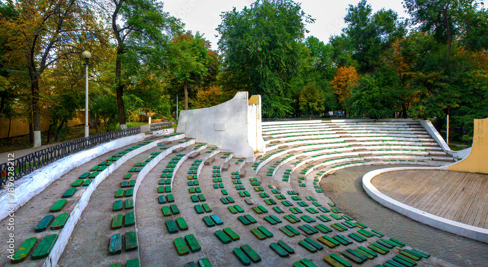 Beautiful park scene and amphitheater for performances in the city park ...