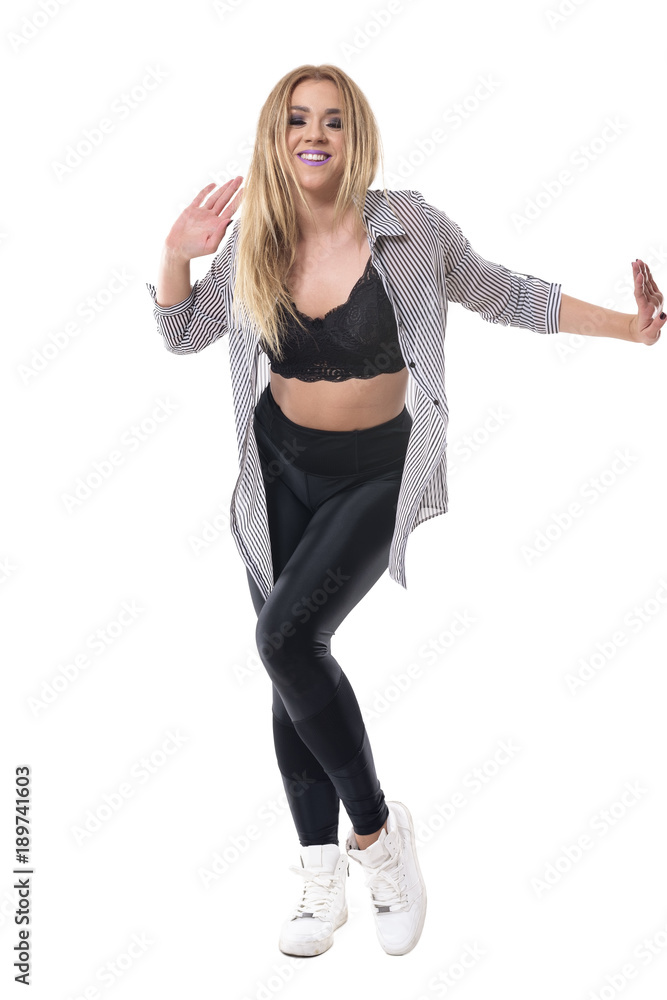 Cheerful smiling excited woman jazz dancer dancing passionately with ...