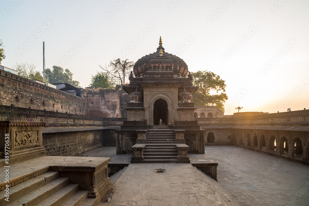 Shiva Lingam temple at Maheshwar, India. Architectural details of stone ...