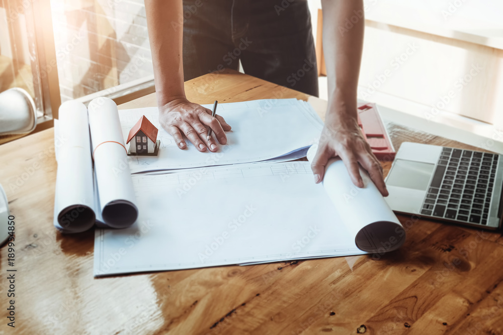 Engineers review designing and layout of the house in the layout to ...