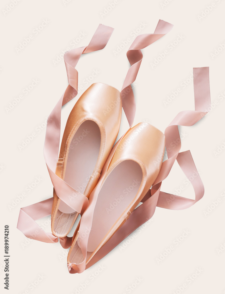 Pink ballet pointe shoes on white isolated background Stock Photo ...
