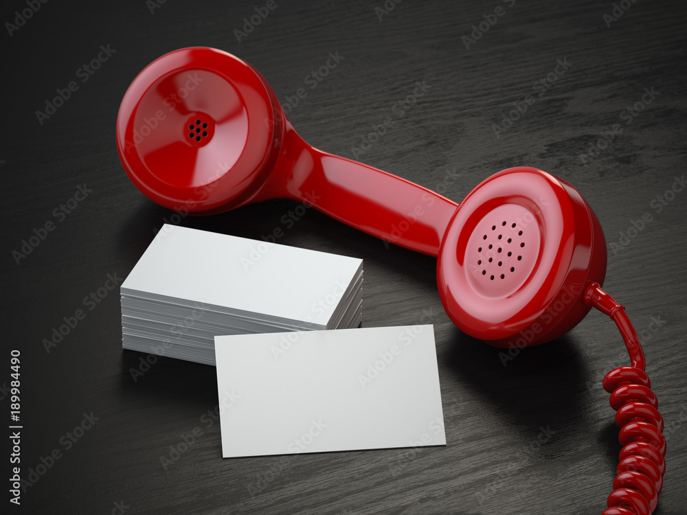 Mockup of blank business cards and red retro phone receiver on the ...