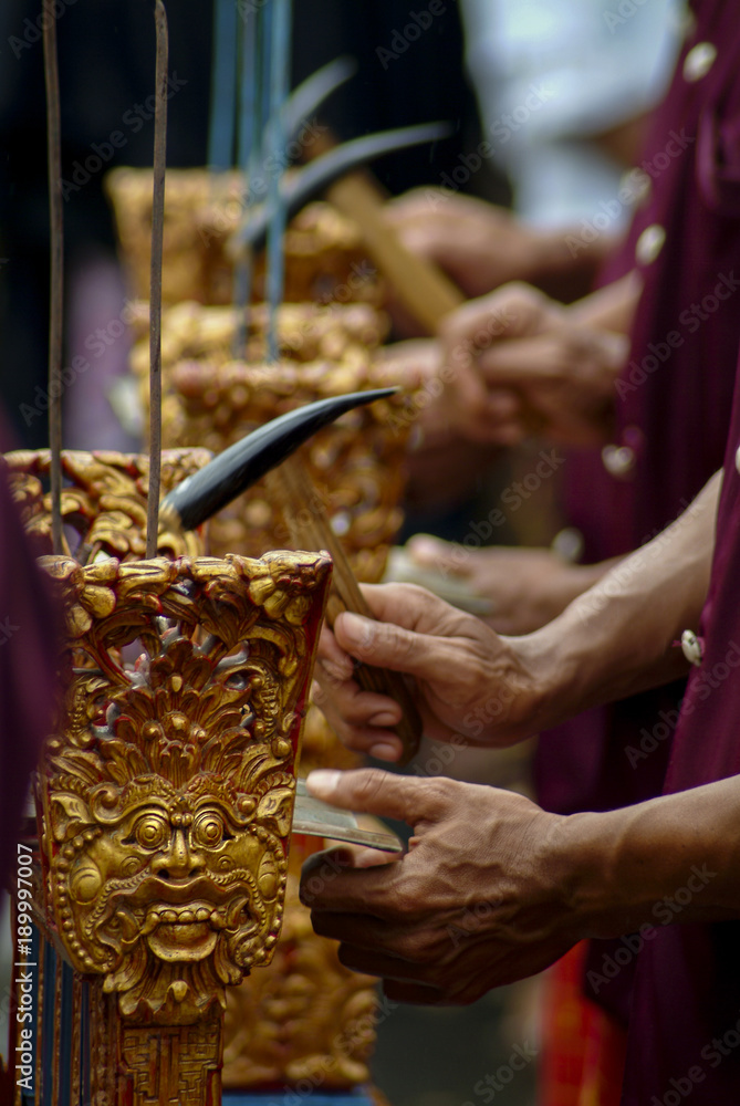 Balinese Gamelan Musician Playing a Percussion Instrument. A gamelan ...