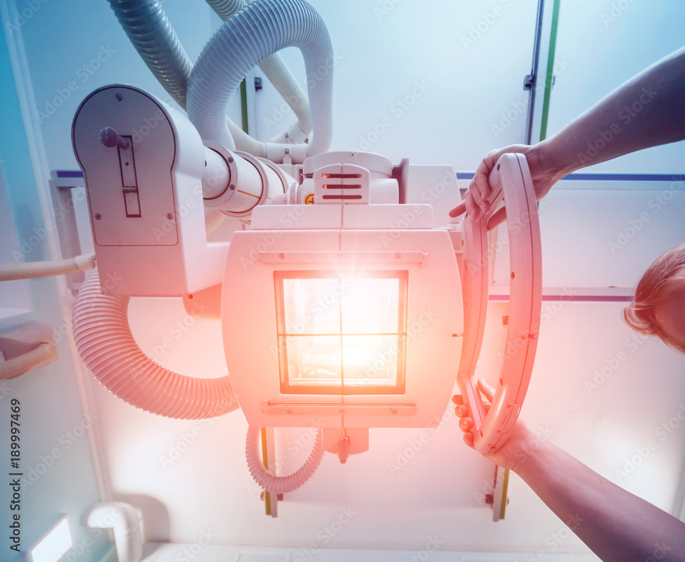X-ray room in a hospital. Classic ceiling-mounted x-ray system. Stock ...