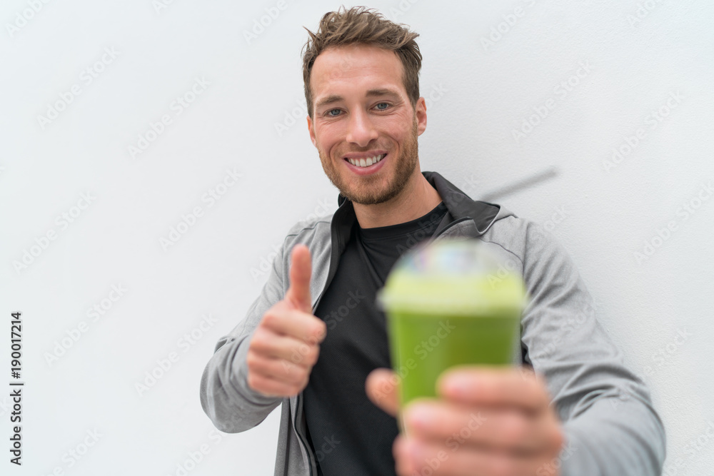 Happy healthy eating smoothie juice man thumbs up. Health food person ...