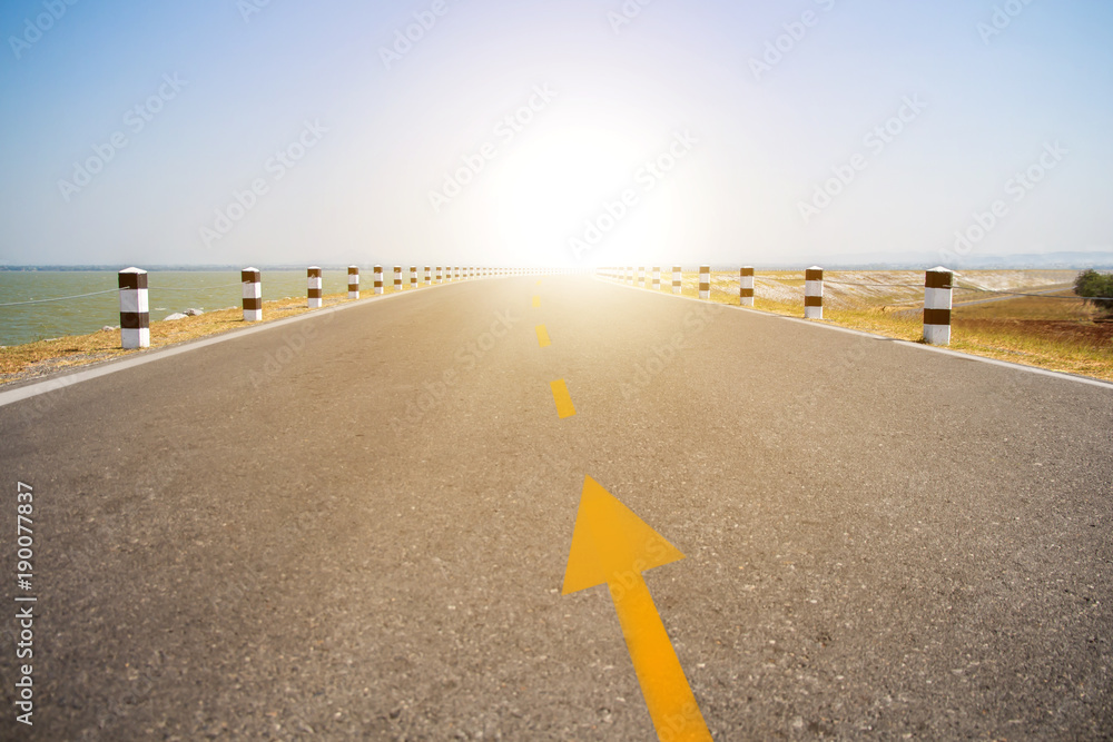 Milestones,black and white milestones with green grass roadside,lake ...