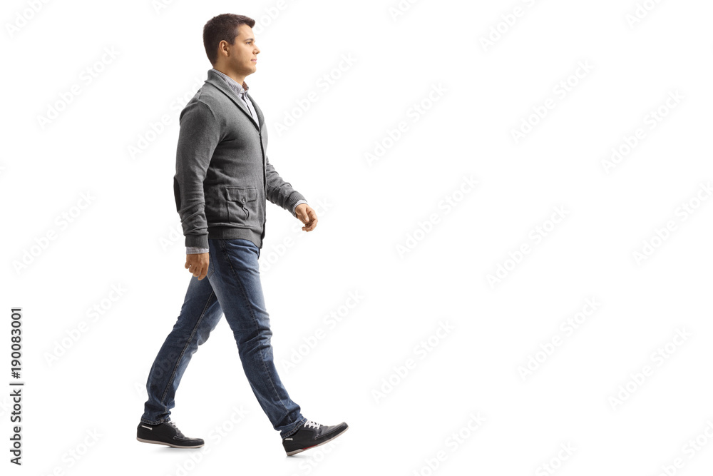 Young man walking Stock Photo | Adobe Stock