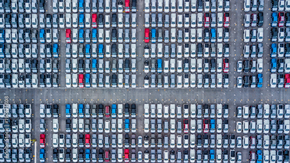 Aerial view new car lined up in the port for business dealership import ...