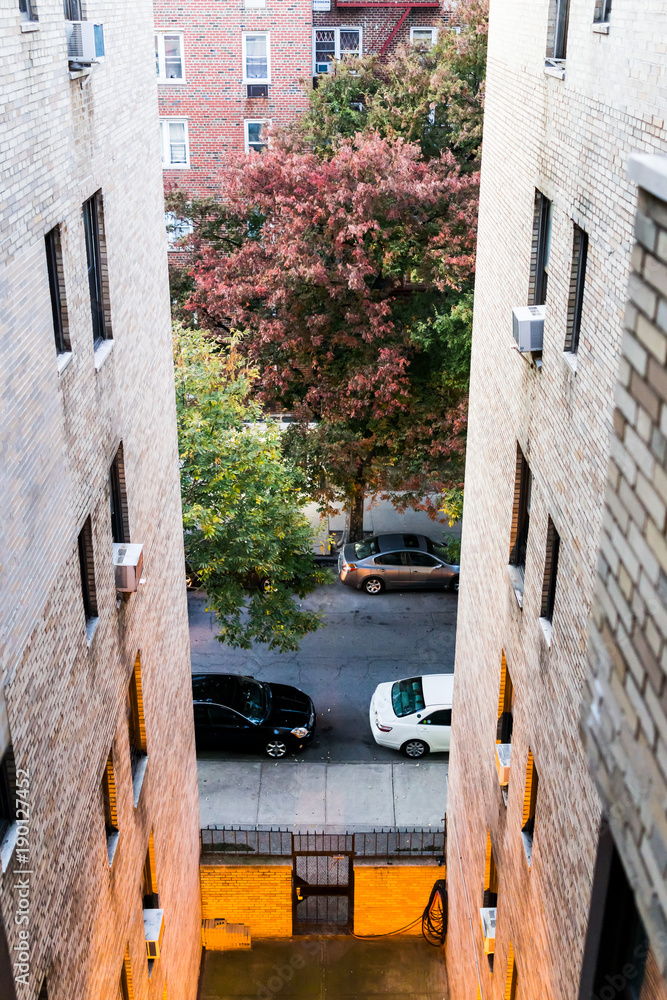 Aerial view of residential apartment building and street road with ...