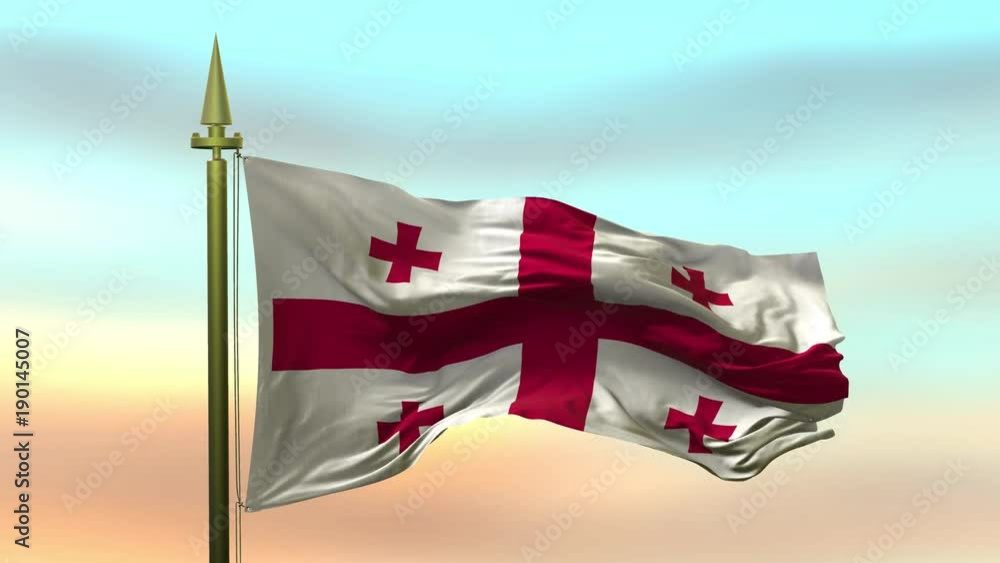 National Flag of Georgia waving in the wind against the sunset sky ...