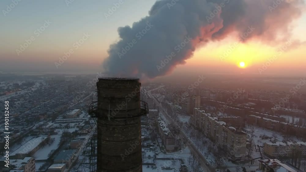 A striking bird`s eye view of a sky-high brick tube with a stream of ...