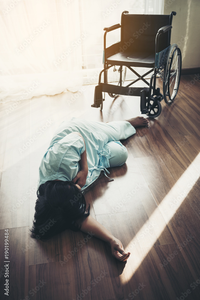 Female patients fall unconscious from a wheelchair on the floor. Heart ...
