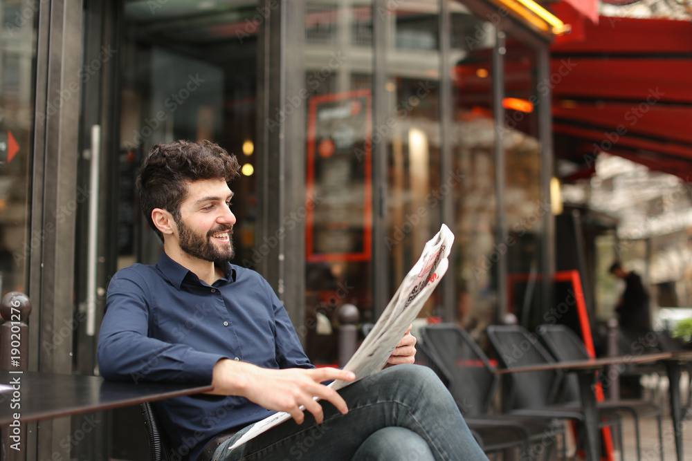 journalist enjoying with reading newspaper columns and articles with ...