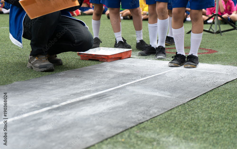 Students boy get set to jump start the starting for long jump ...