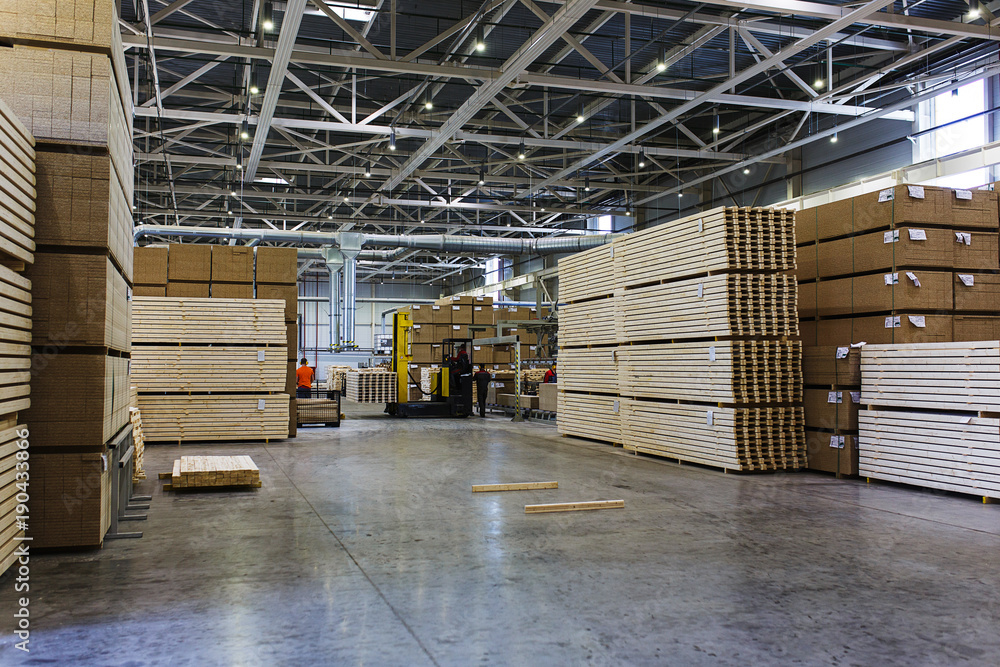 Modern production and storage room with lumber produced and ready for ...