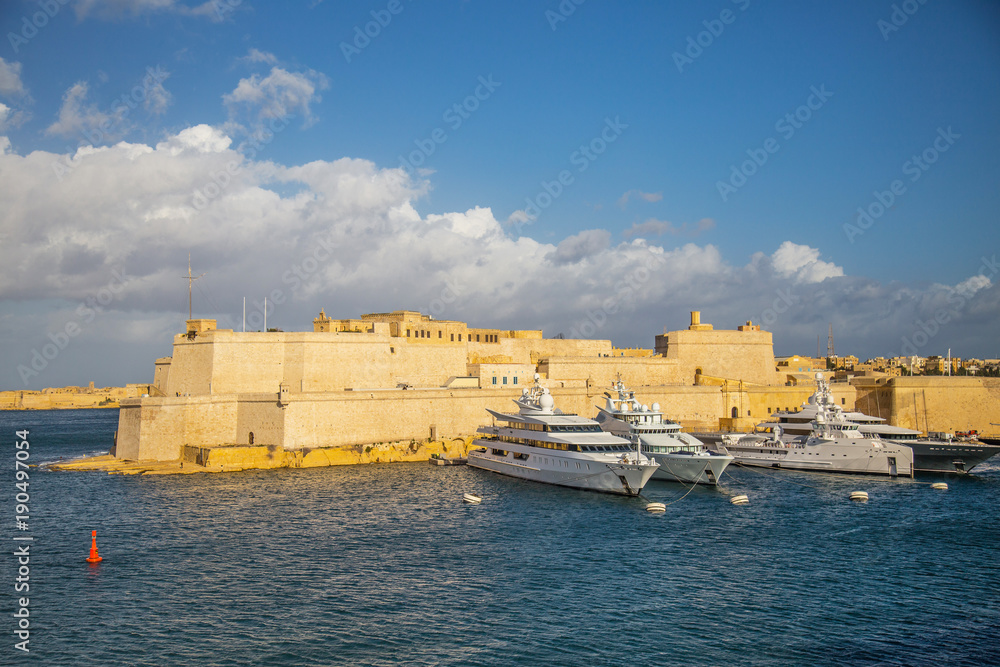 Fort Saint Angelo is a large bastioned fort in Birgu, Malta, located in ...