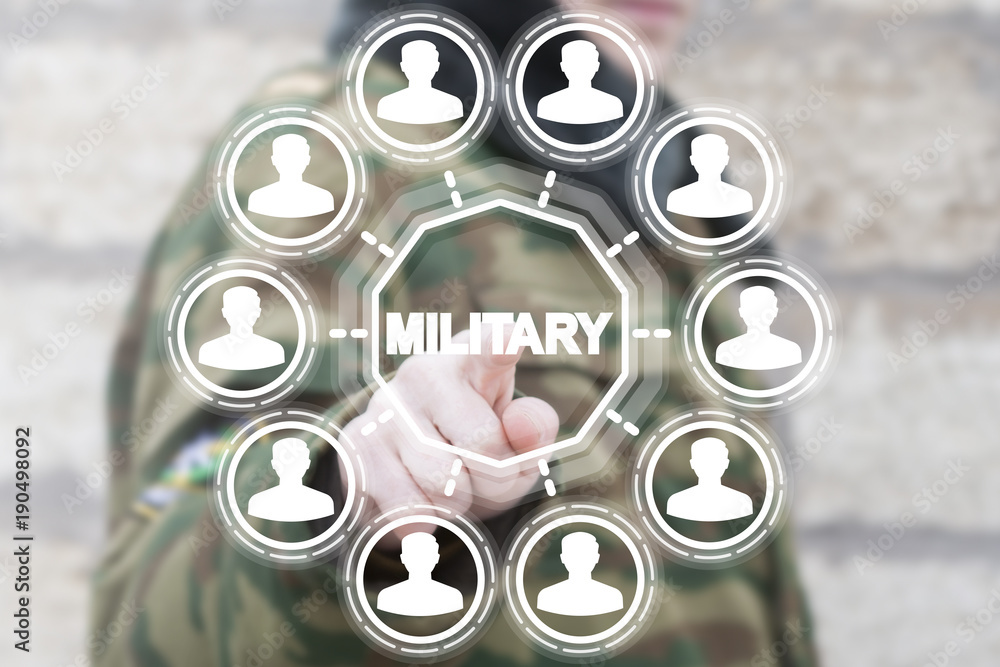 Soldier using virtual touchscreen presses military text button ...