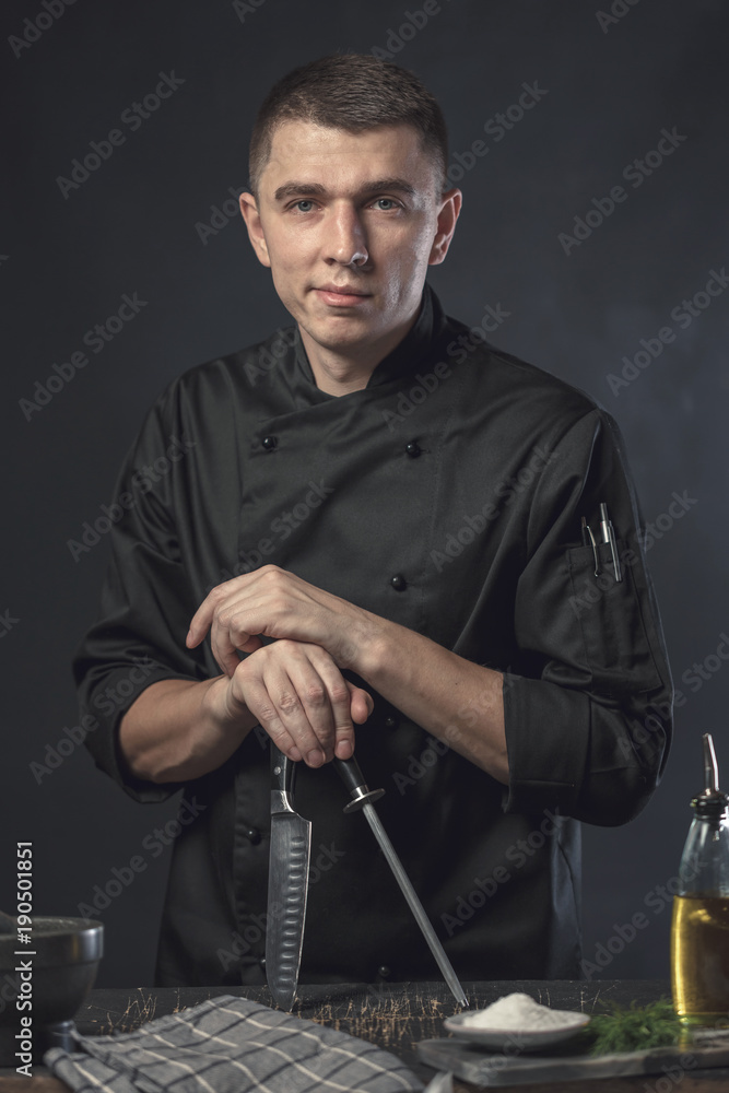 Chef Koch in der Küche Stock-Foto | Adobe Stock