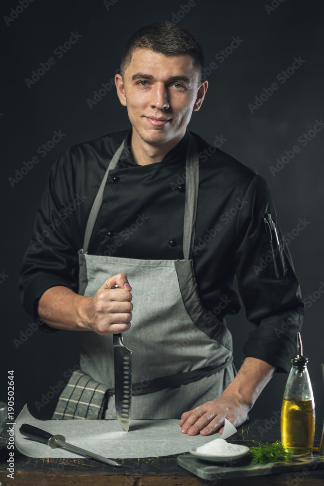 Chef Koch in der Küche Stock-Foto | Adobe Stock