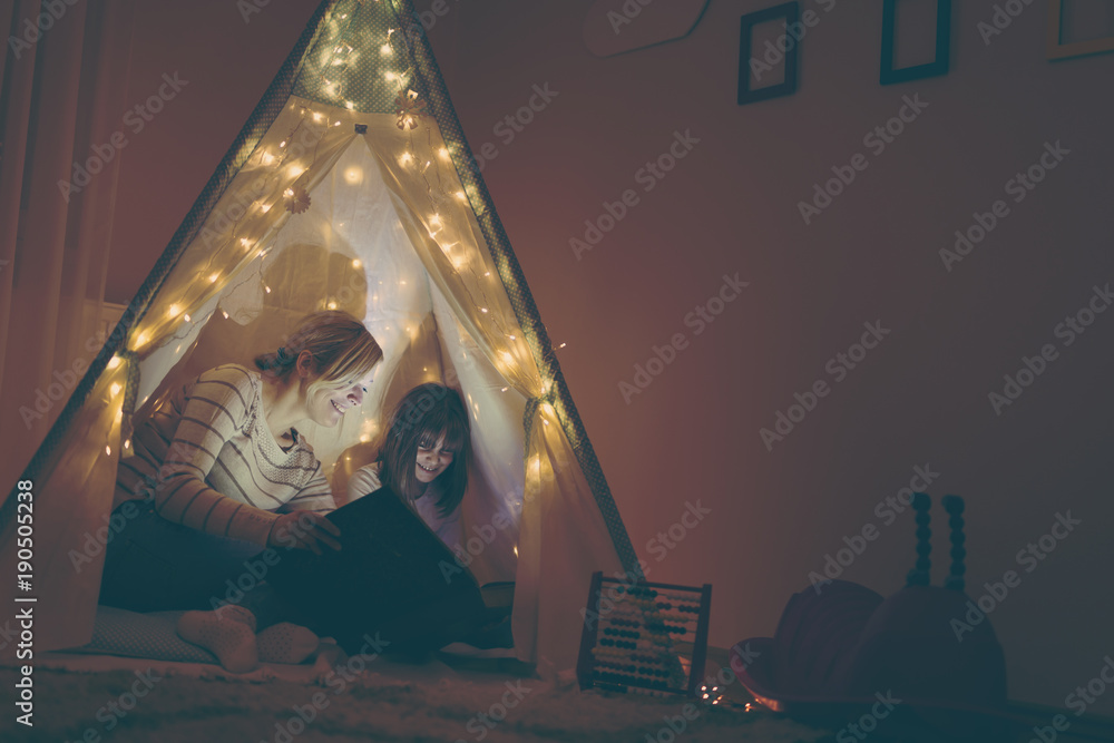 Reading a story Stock Photo | Adobe Stock