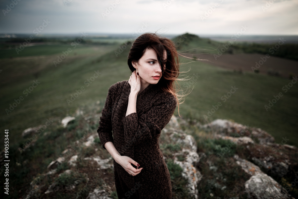 Girl Standing In The Wind