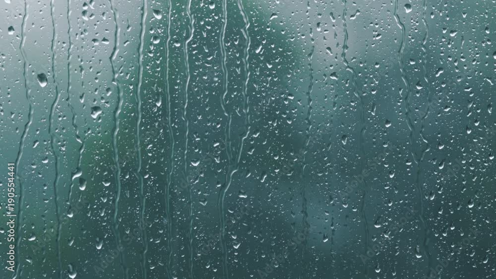 real rain drops sliding on window glass Stock Video | Adobe Stock