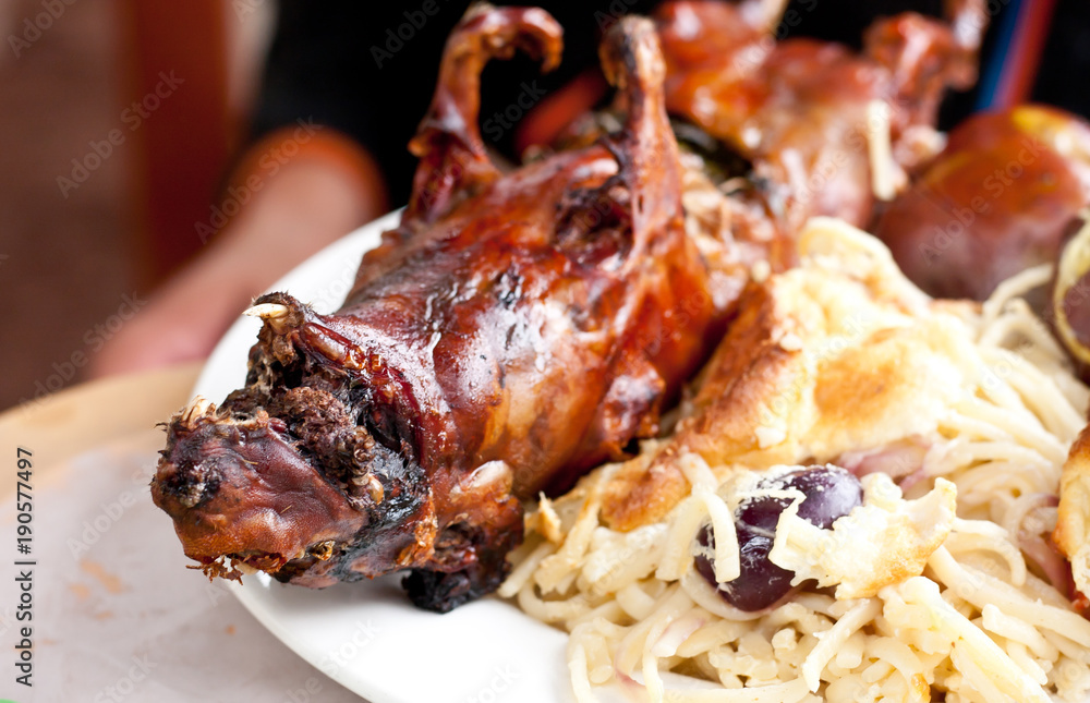 Guinea pig - typical peruvian delicacy - Tipón - Peru Stock Photo ...