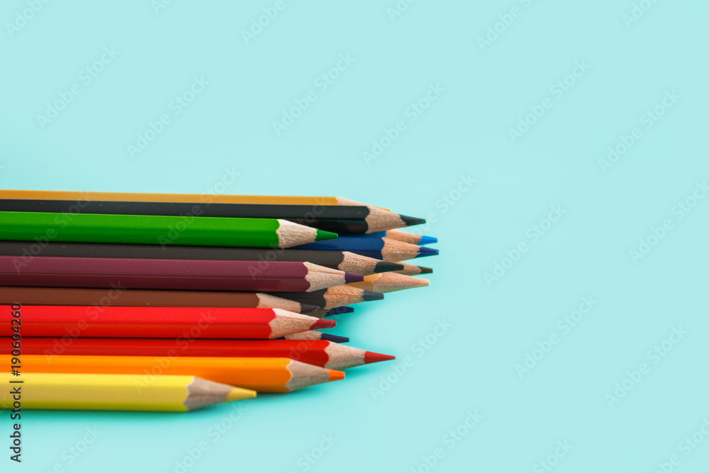 colored pencils on pastel background Stock Photo | Adobe Stock