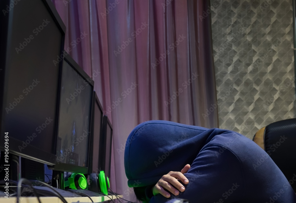 Stressed gamer while playing computer games until morning at internet ...