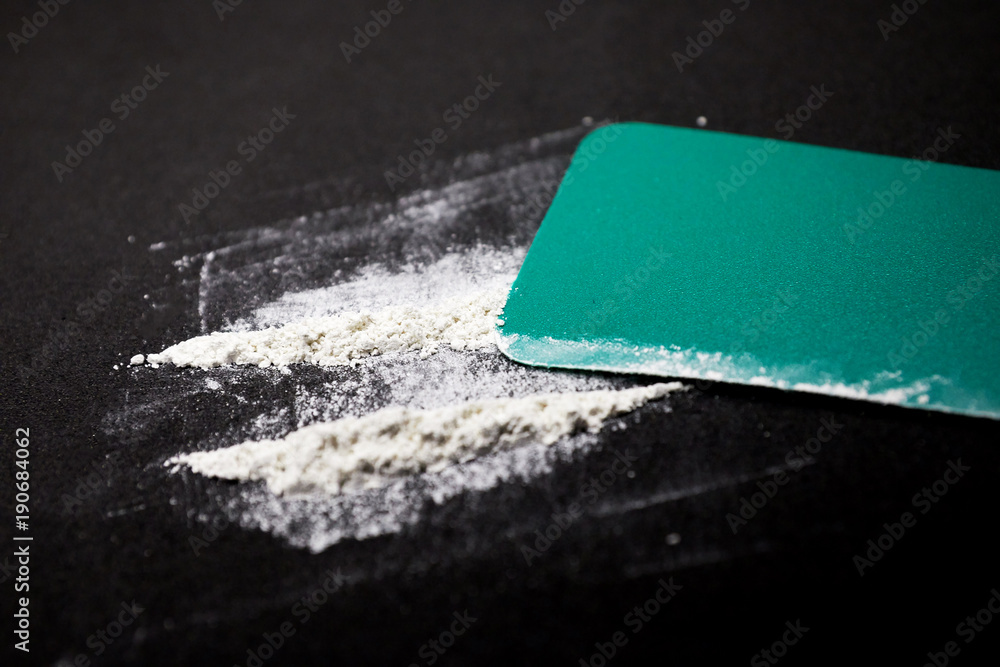 drug use, people, addiction and substance abuse concept. Rolled ...