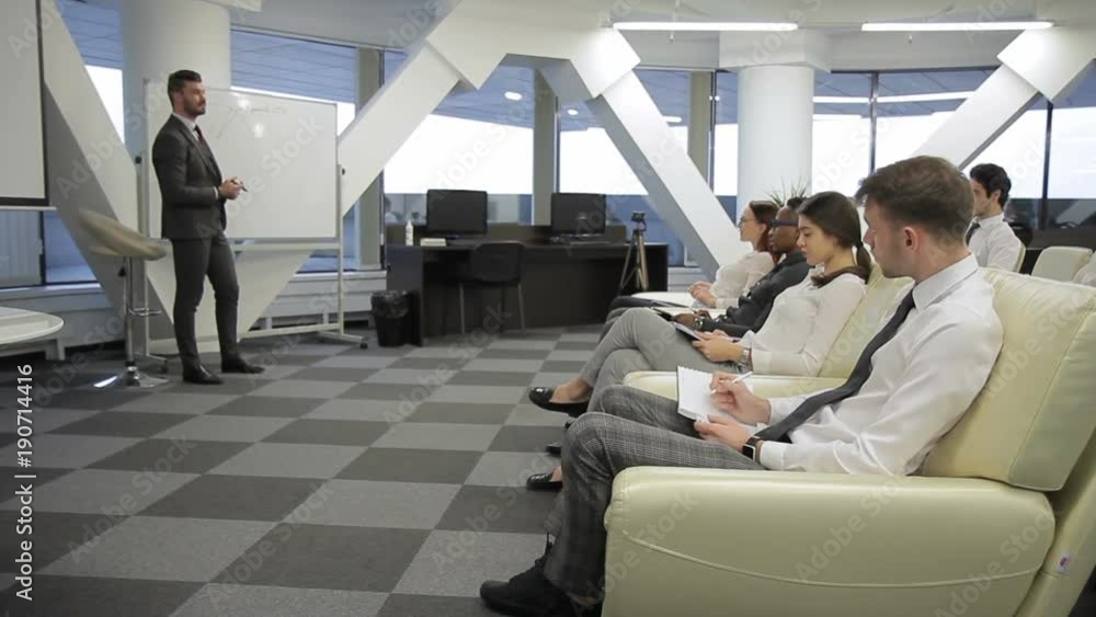 The group of male and female businesspeople is on the business ...