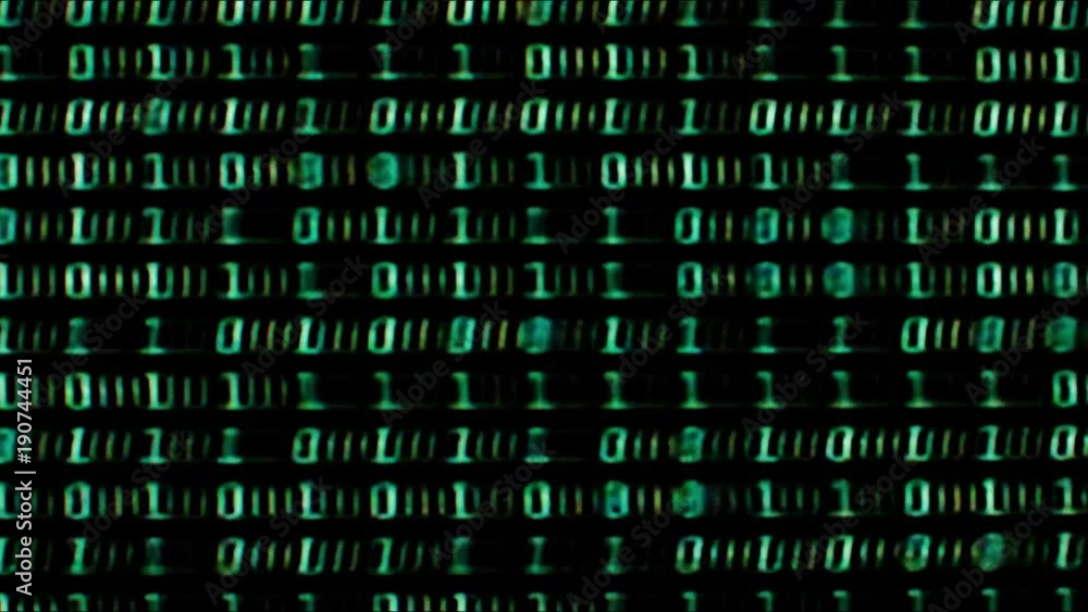 green binary code running down a computer screen with addded glitch and ...