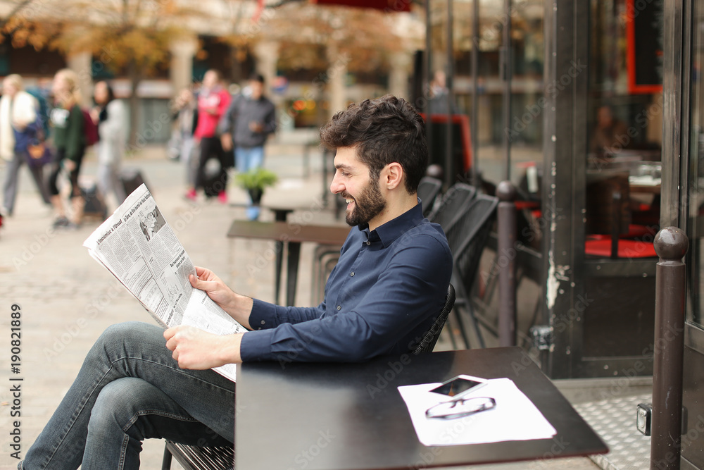 journalist enjoying with reading newspaper columns and articles with ...