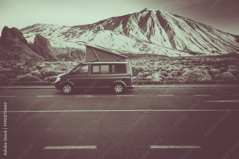 Small travel vehicle camping van or big car with folding rooftop with ...