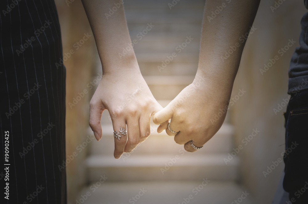 Couple Walking Hand In Hand