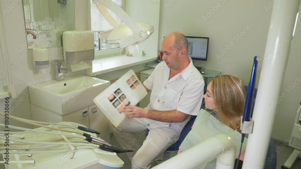 Professional look. Professional male dentist orthodontist checking ...