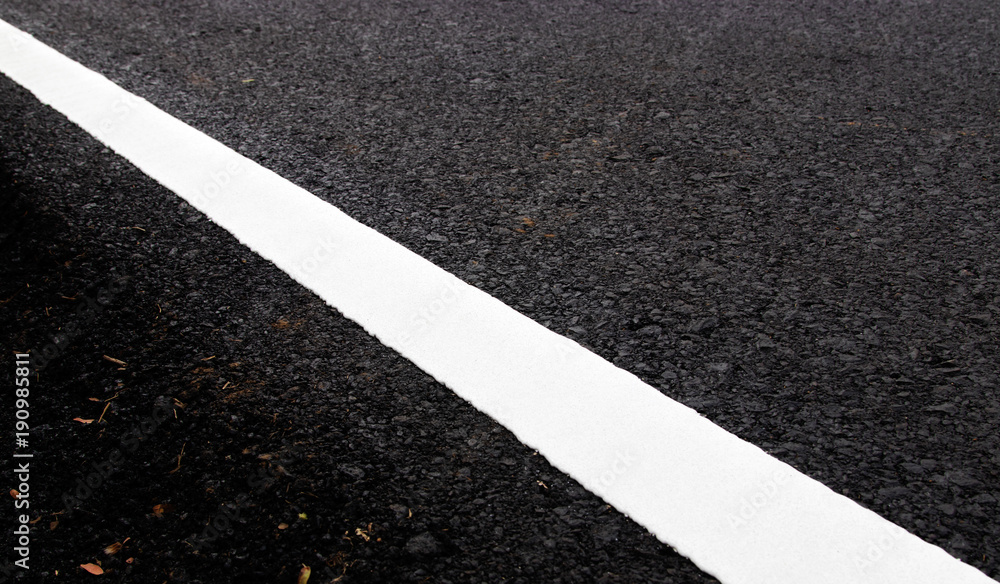 white solid line. Road markings on asphalt on the street. Stock Photo ...